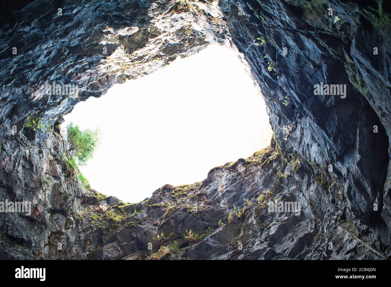 Hole in the rocky cave inside from bottom to top upwards Stock Photo ...