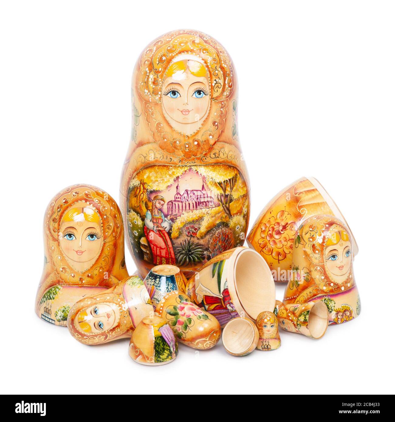 Russian folk wooden nesting doll "matrioshka" isolated over white ...