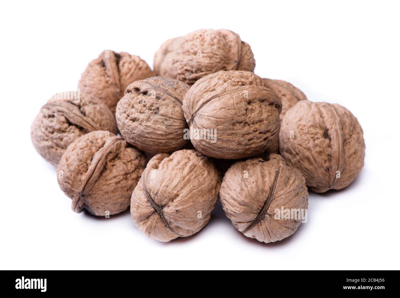 Group of big whole walnuts isolated on white background Stock Photo - Alamy