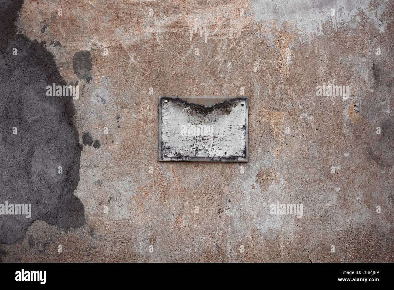 Old shabby plaque on the wall, antique background Stock Photo - Alamy
