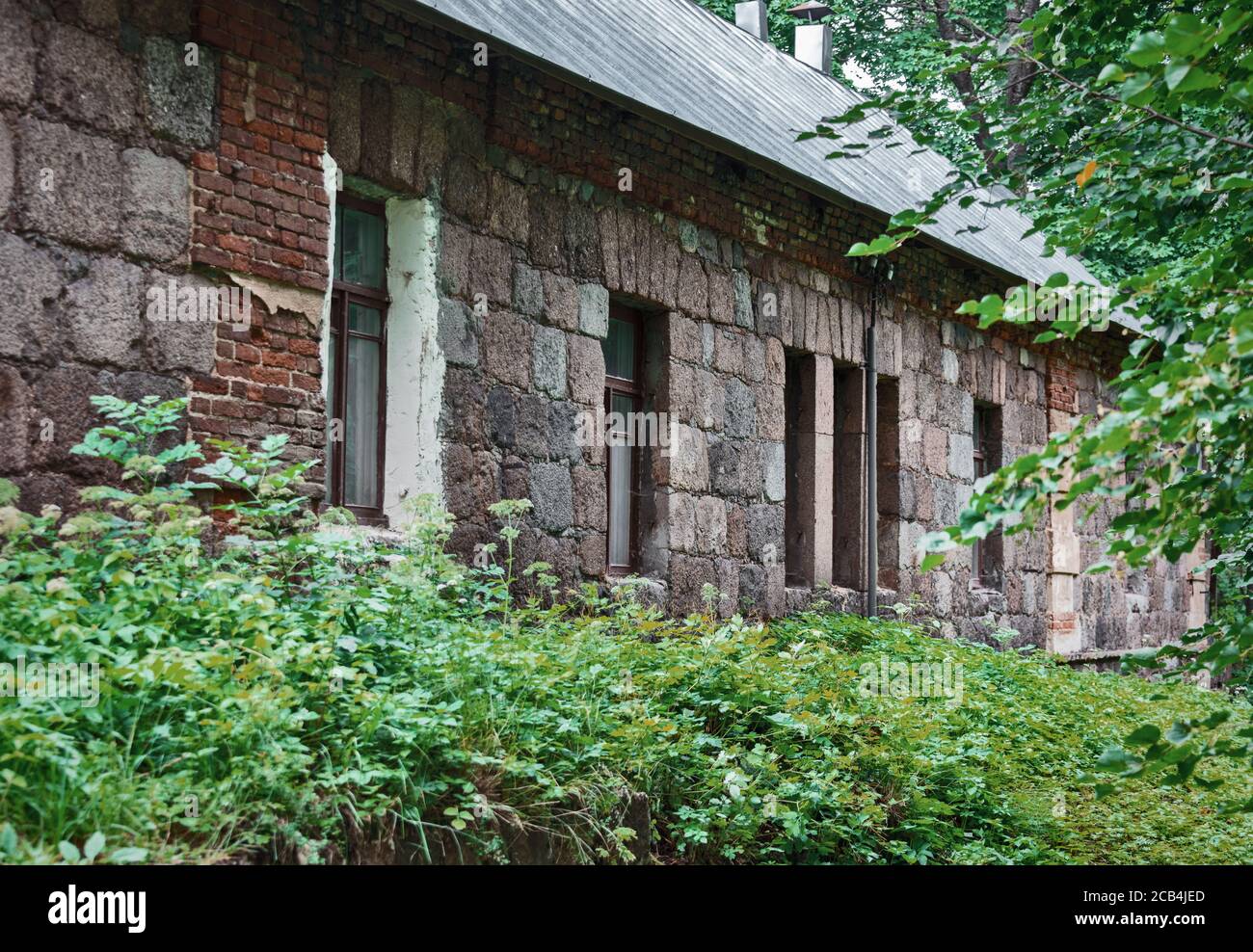 Old abandoned brick building at the nature Stock Photo - Alamy