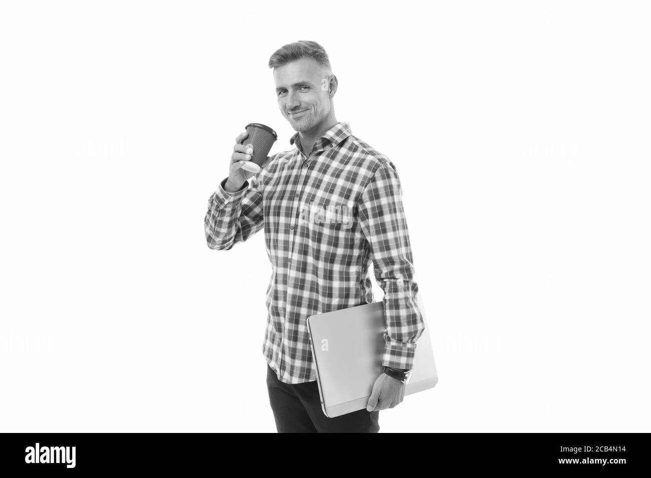 Internet cafe. Happy man hold takeaway cup and laptop. Coffee shop or ...