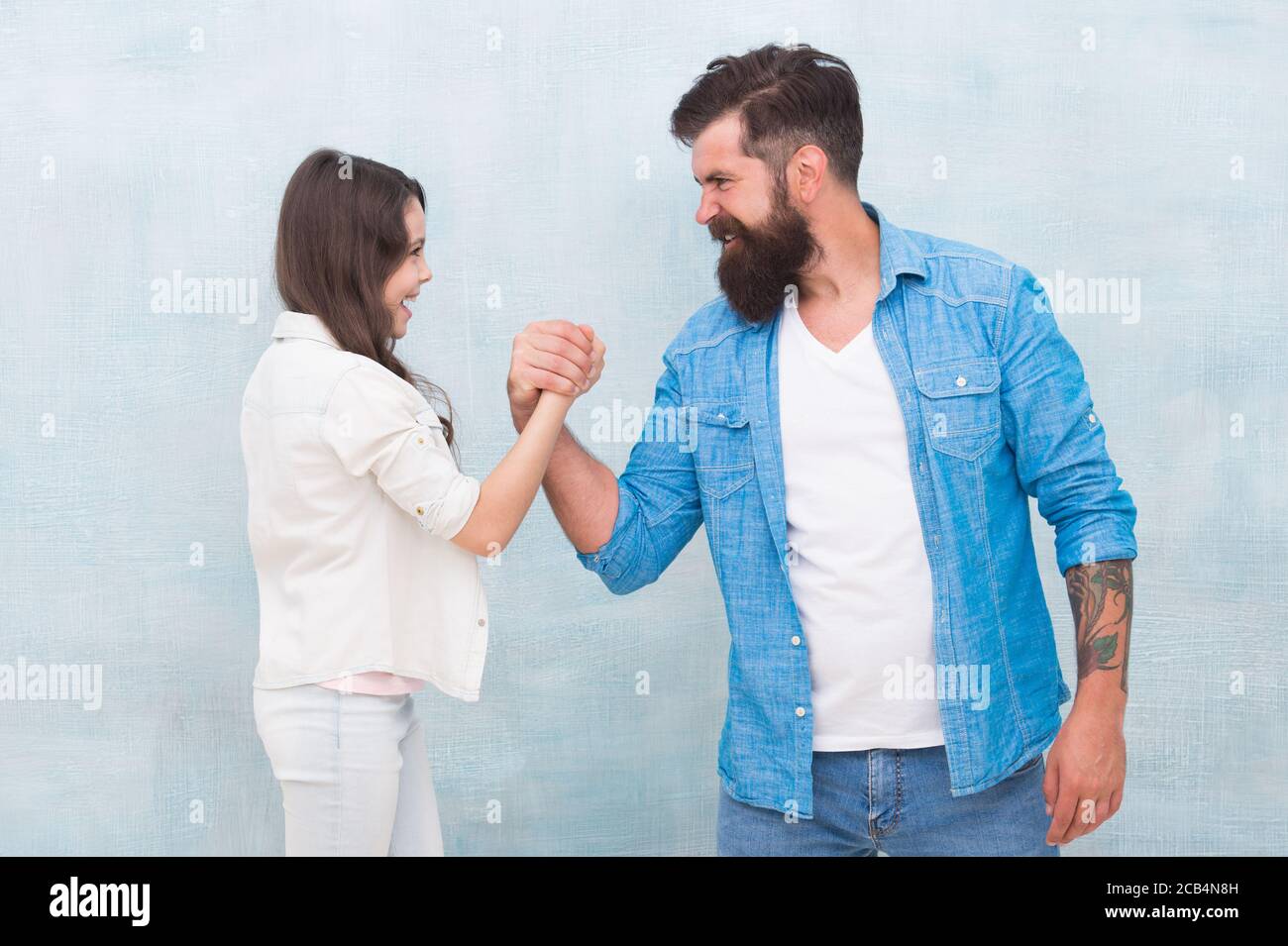 Daughter arm wrestling hi-res stock photography and images - Alamy