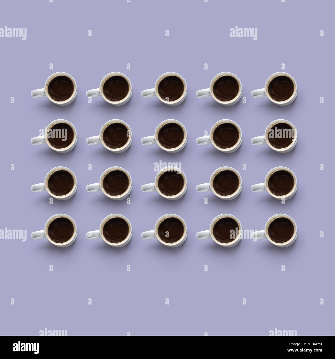 Flat lay of coffee cups forming a rectangle, with copy space on the top ...