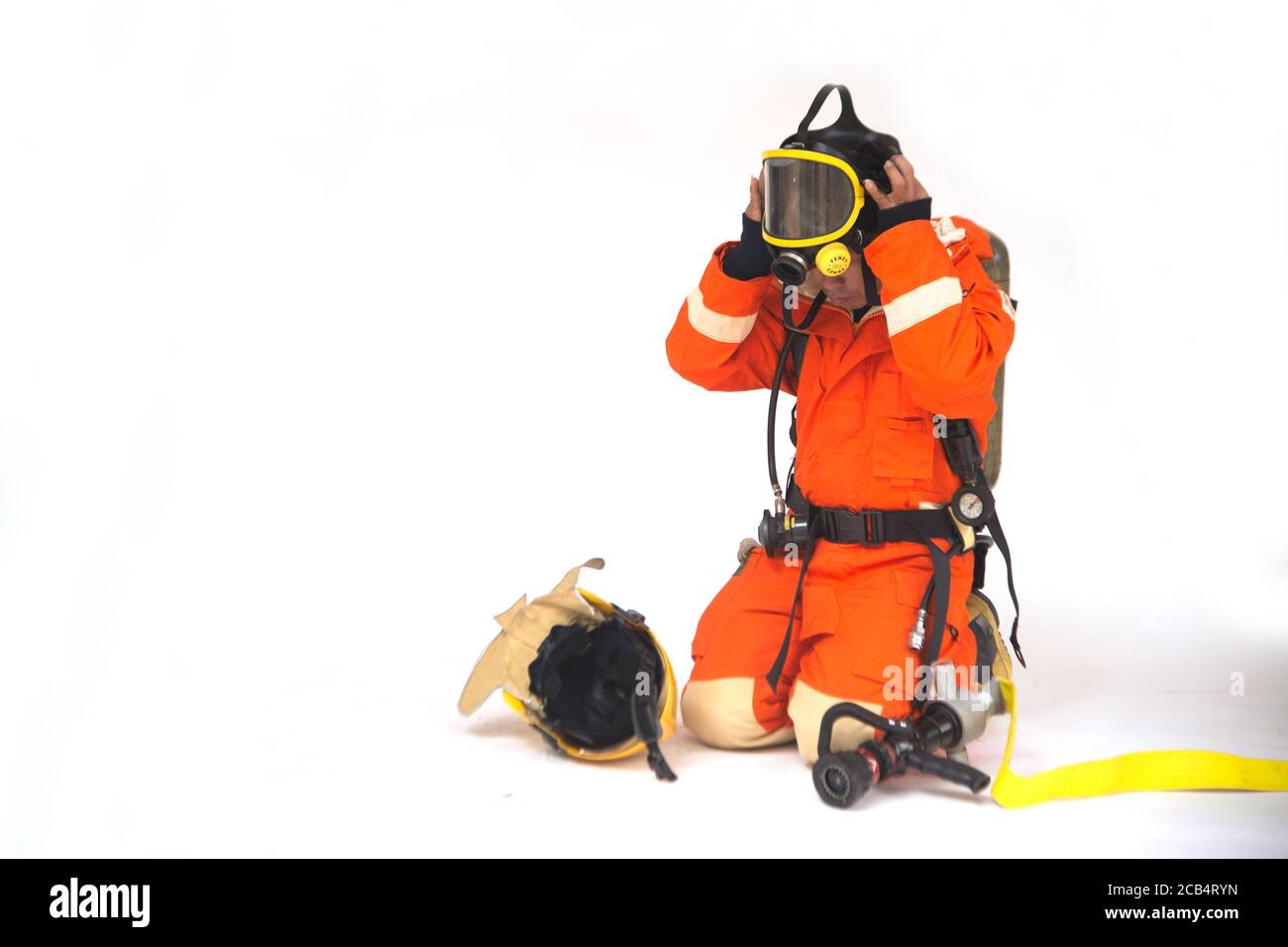 The portrait of Asian firefighters are wearing orange fire protection ...