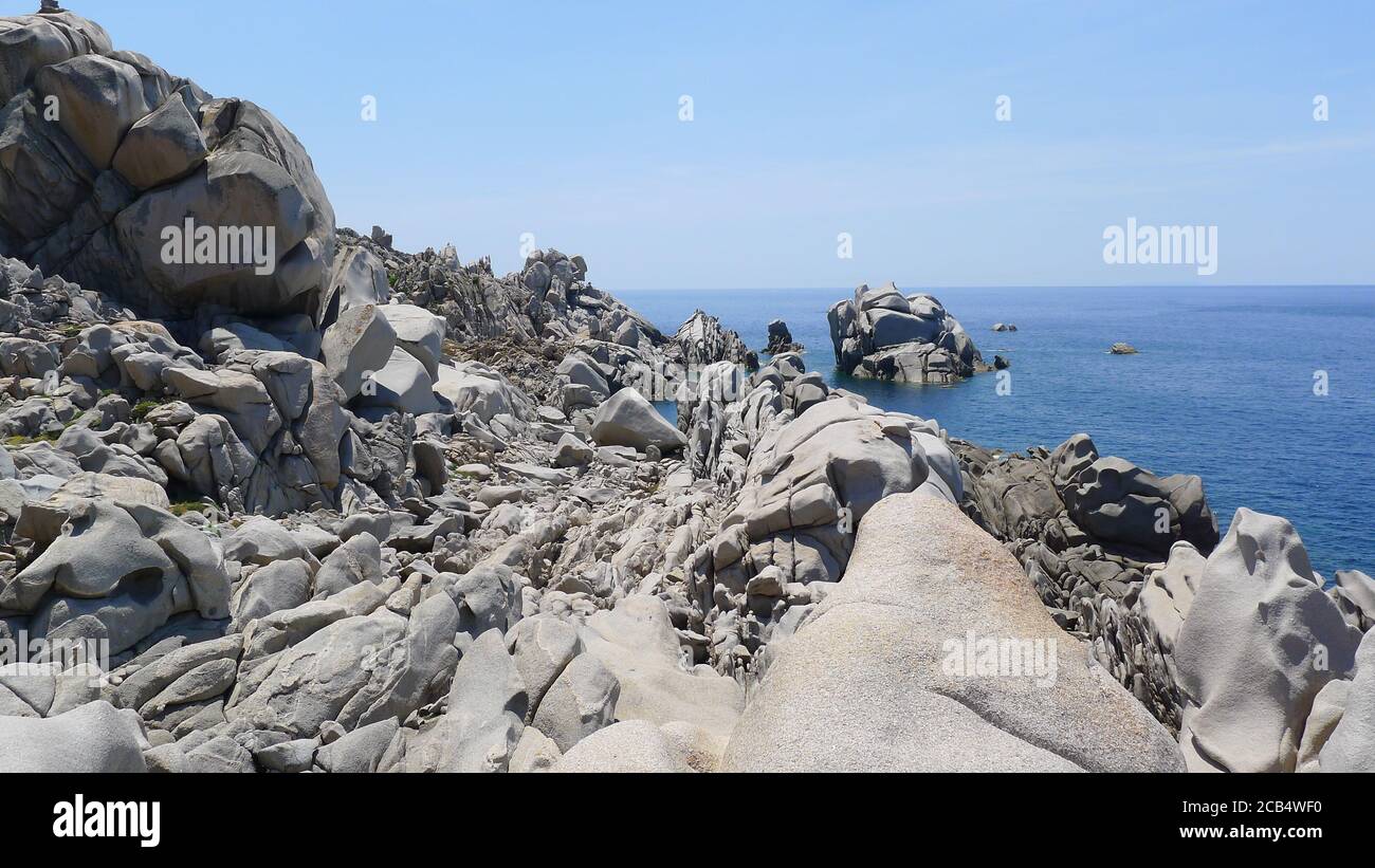 Fascinating white granite formation in Sardinia Stock Photo - Alamy
