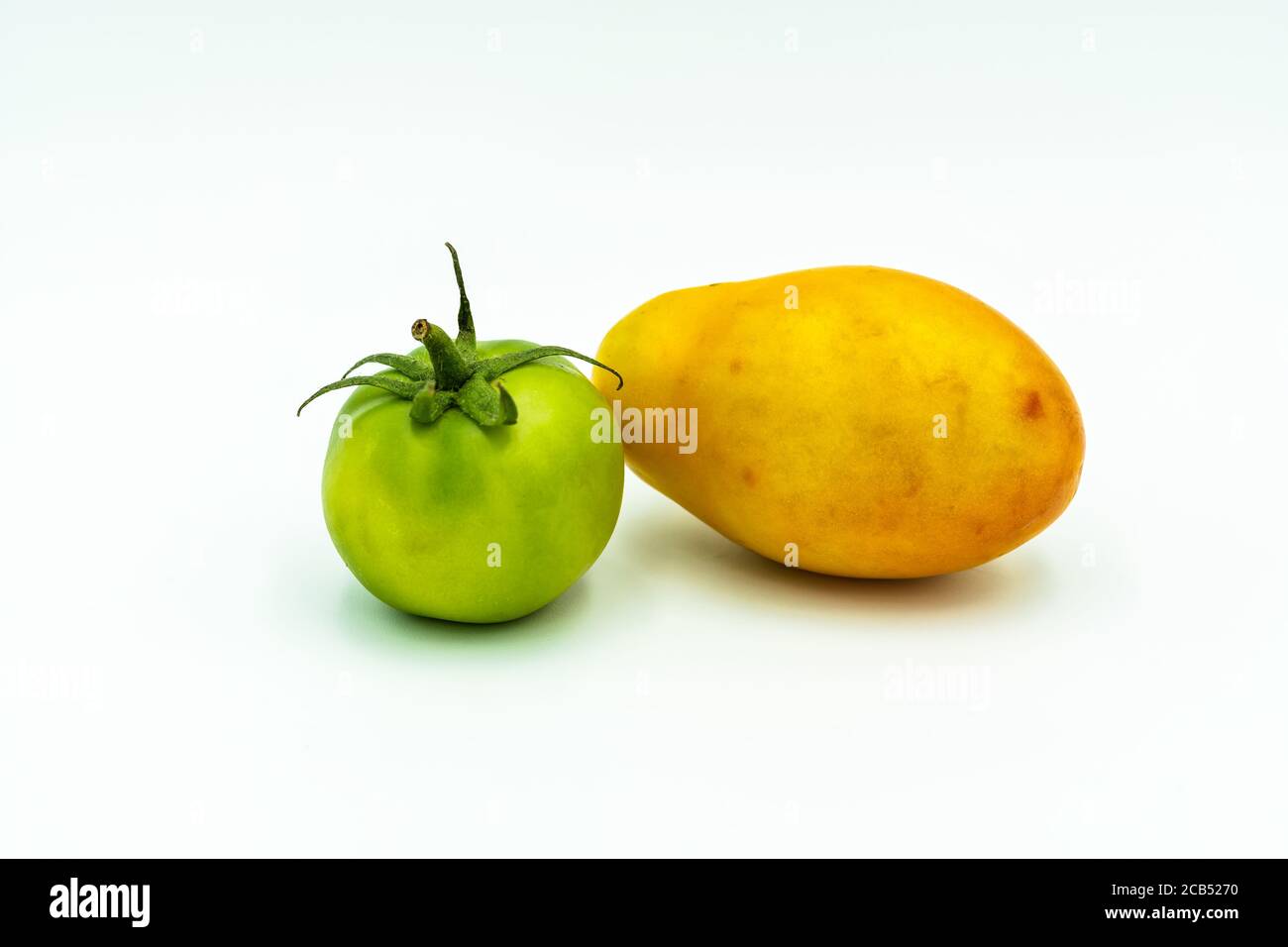 Two different types tomatoes hi-res stock photography and images - Alamy