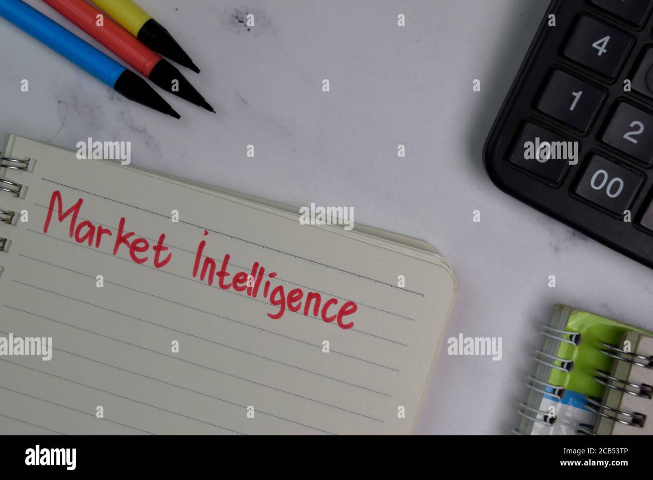 Market Intelligence write on a book isolated on office desk Stock Photo ...