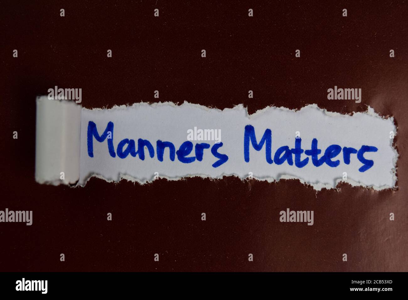 Manners Matters Text written in torn paper Stock Photo - Alamy