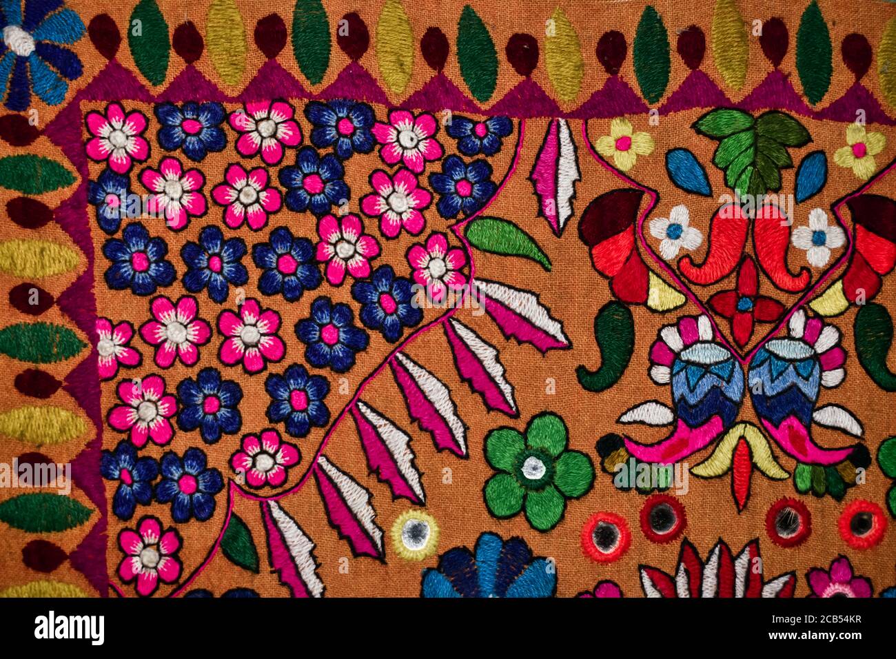 Background colorful image of hand made needle work flower design Stock ...