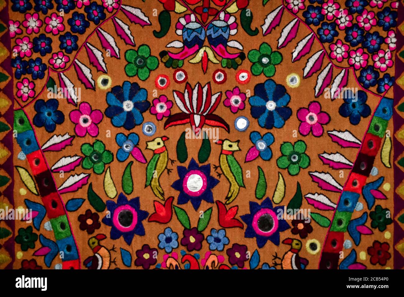 Background colorful image of hand made needle work flower design Stock ...