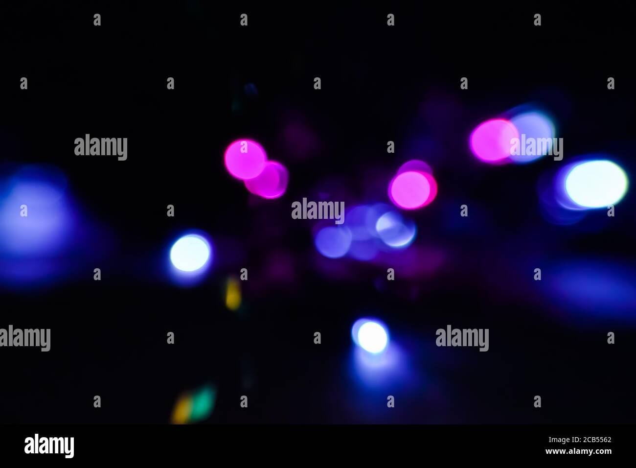 Background image of unfocused lights with black background Stock Photo ...
