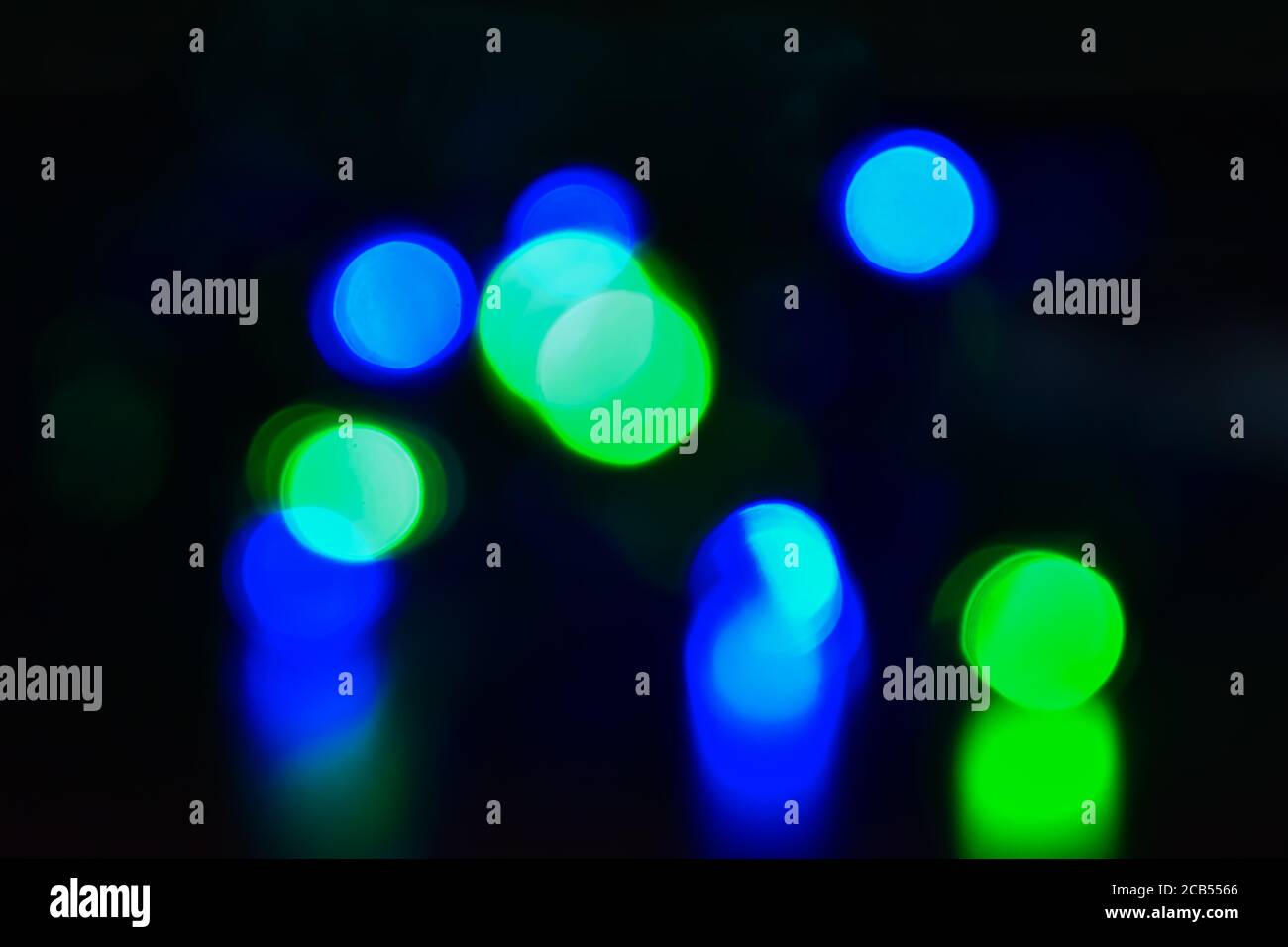 Background image of unfocused lights with black background Stock Photo ...