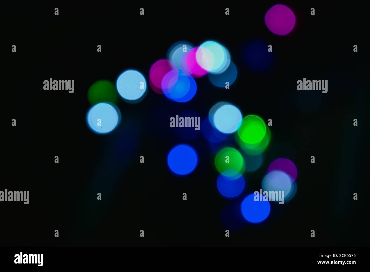 Background image of unfocused lights with black background Stock Photo ...