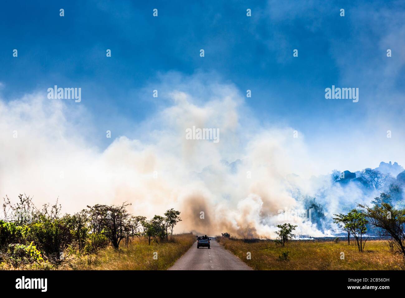 Matobo hills, Country road and agricultural field burning, Matobo ...