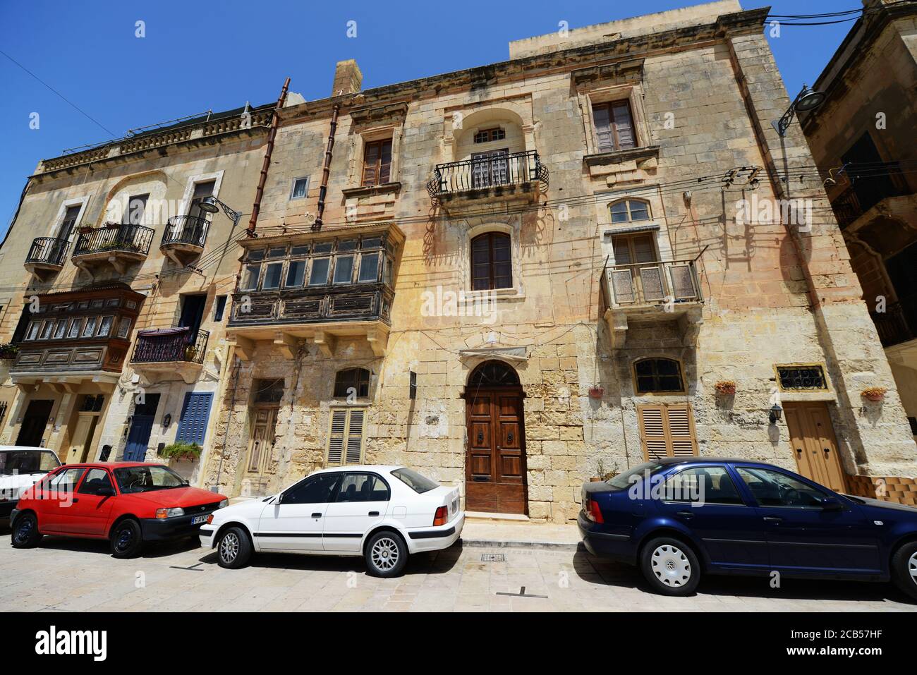 Walking through the narrow streets of Birgu, Malta Stock Photo - Alamy