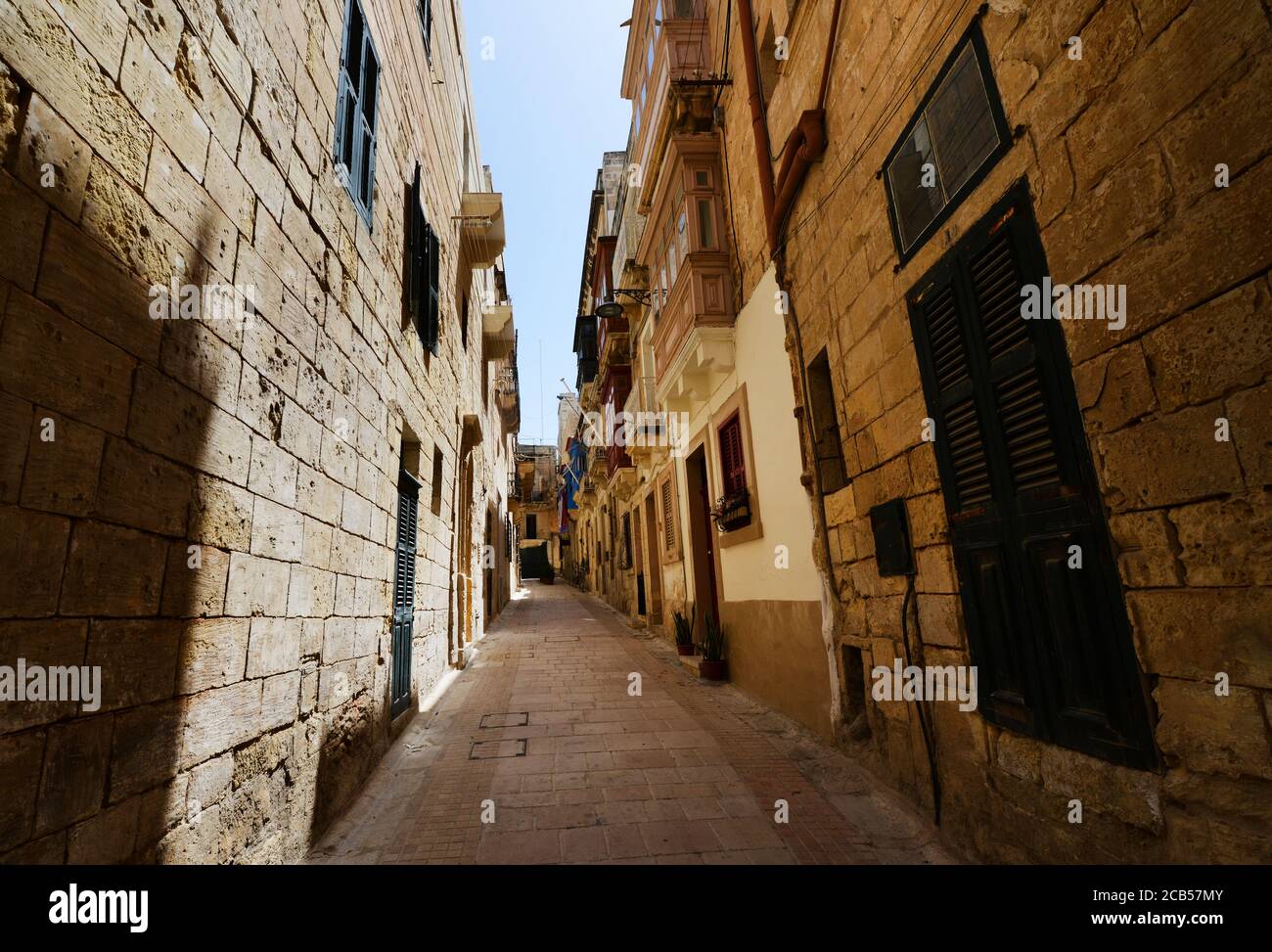 Walking through the narrow streets of Birgu, Malta Stock Photo - Alamy