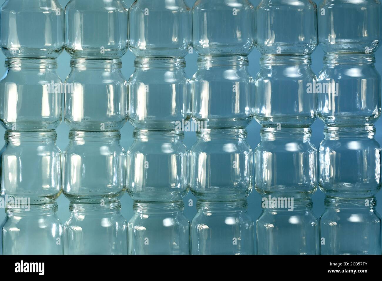 The background is from of transparent small cans, large fragment of a ...