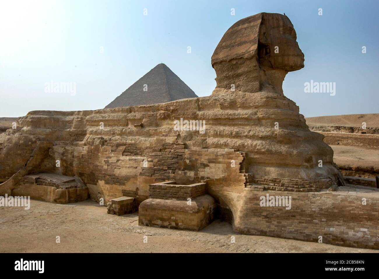 The Great Sphinx of Giza and the Pyramid of Khufu located on the Giza ...