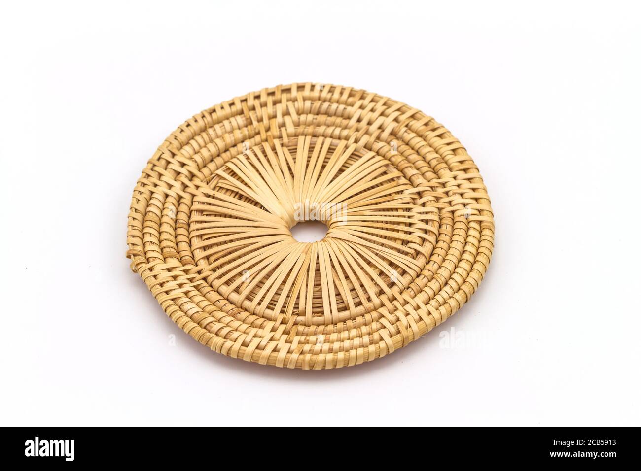 Rattan weave mat on a white background Stock Photo - Alamy
