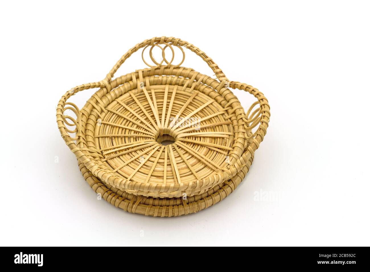 Rattan weave mat on a white background Stock Photo - Alamy