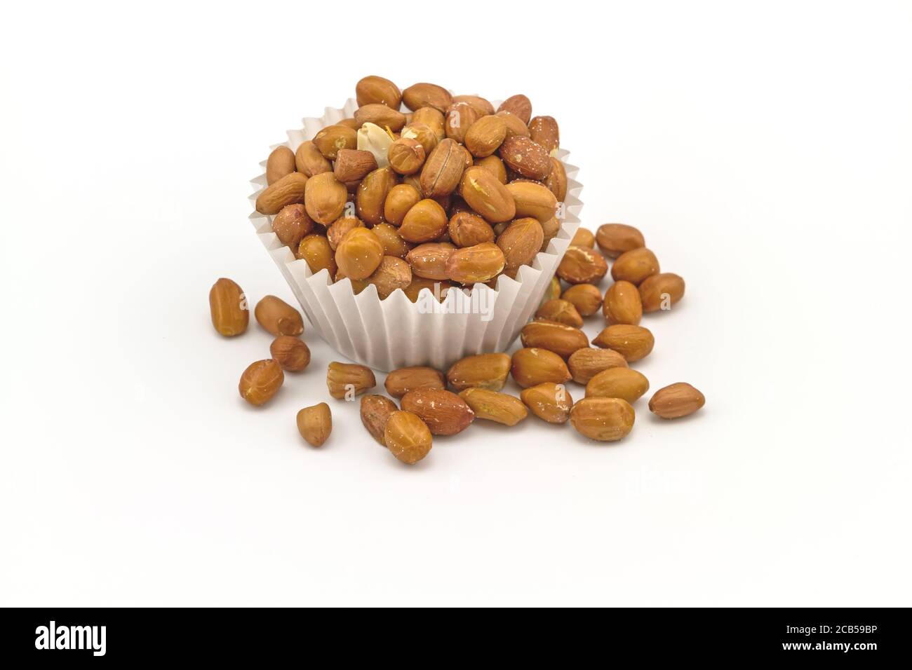 Dessert : salted peanuts in paper cup isolated on white background ...