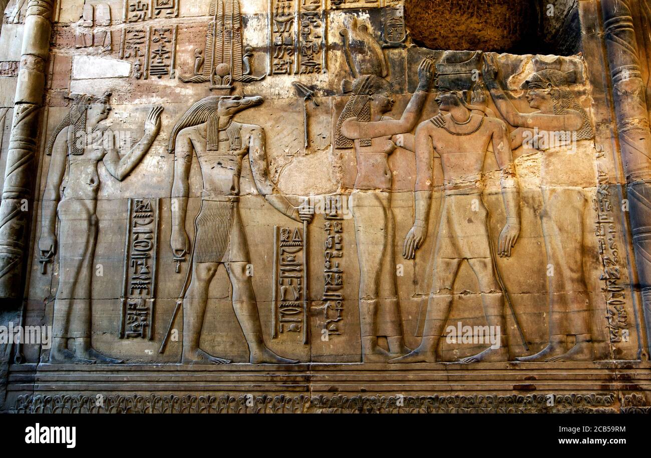 A beautifully decorated ancient stone wall at the Temple of Kom Ombo in ...