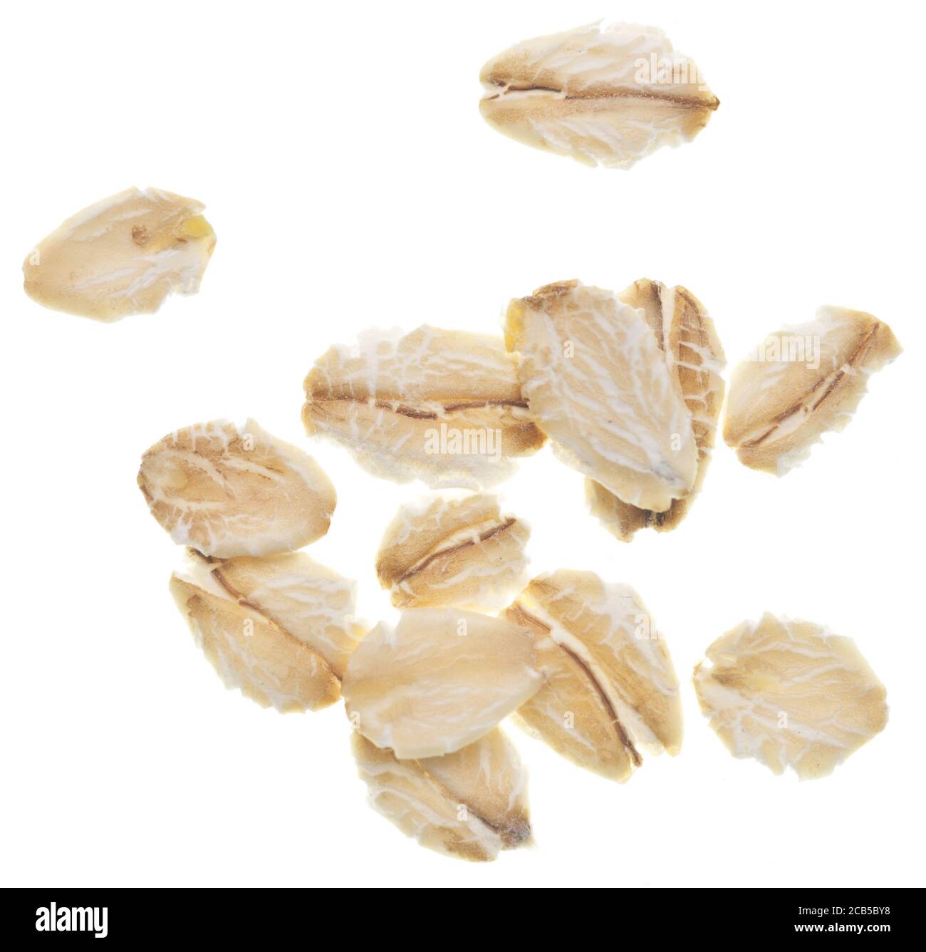 Oat flakes isolated on white background Stock Photo - Alamy