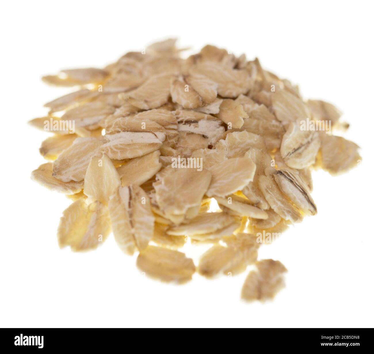 Oat flakes isolated on white background Stock Photo - Alamy