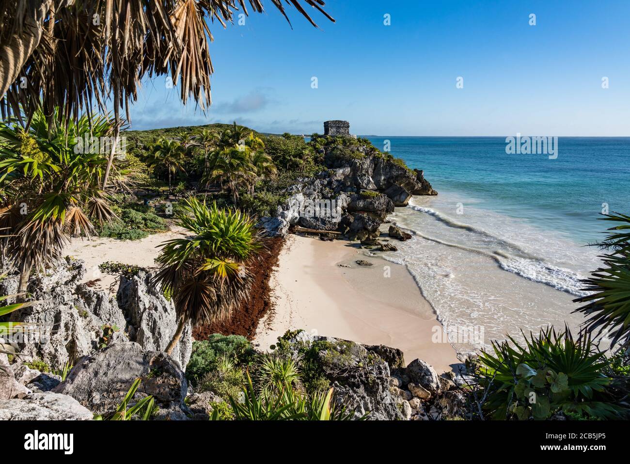 The Temple of the Wind God in the ruins of the Mayan city of Tulum on ...