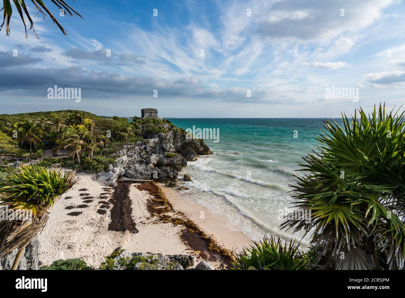 The Temple of the Wind God in the ruins of the Mayan city of Tulum on ...