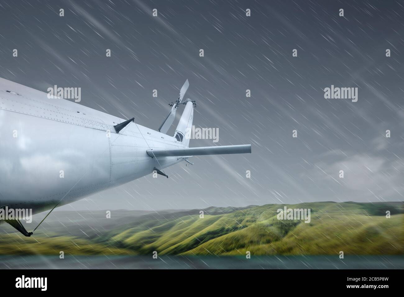 Airplane flying in the air with rainy weather Stock Photo - Alamy