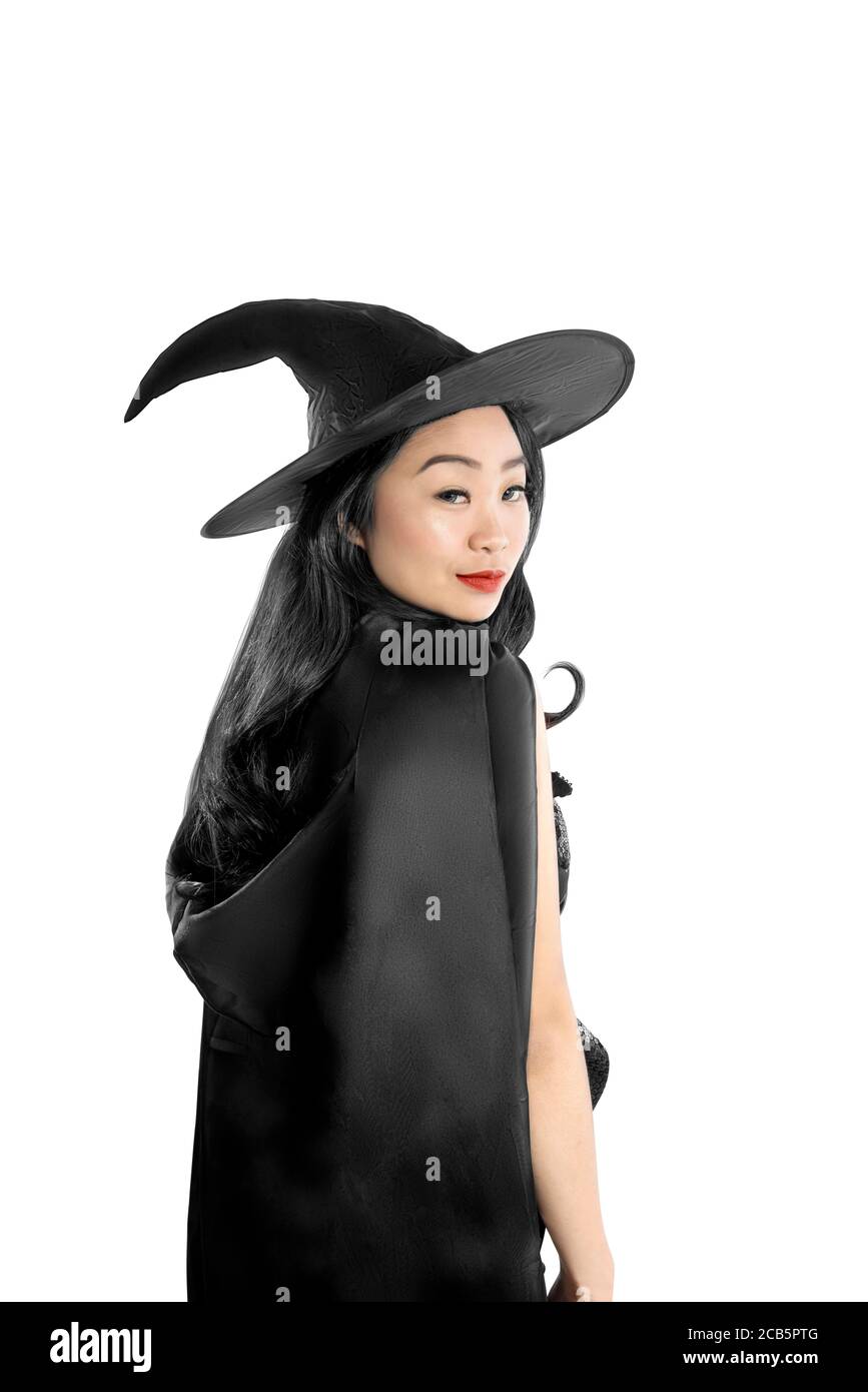 Asian witch woman with hat isolated over white background Stock Photo ...