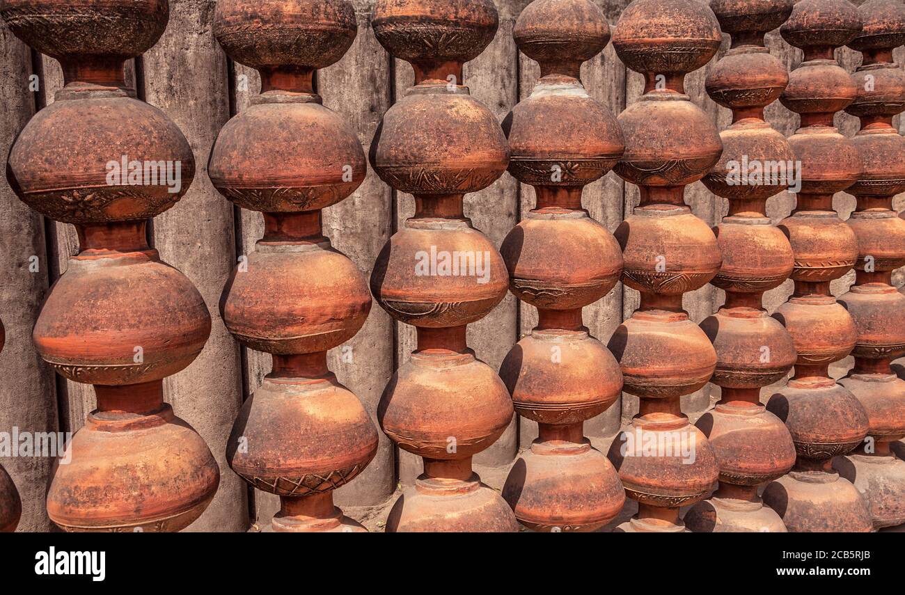 Stacks of clay pots background Stock Photo - Alamy