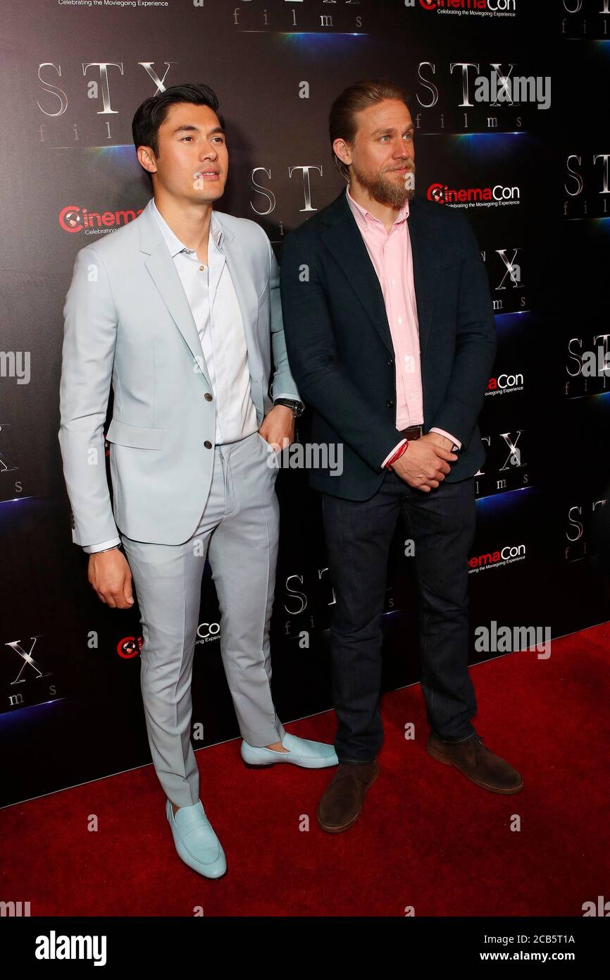 LAS VEGAS - APR 2: Henry Golding, Charlie Hunnam at the 2019 CinemaCon ...