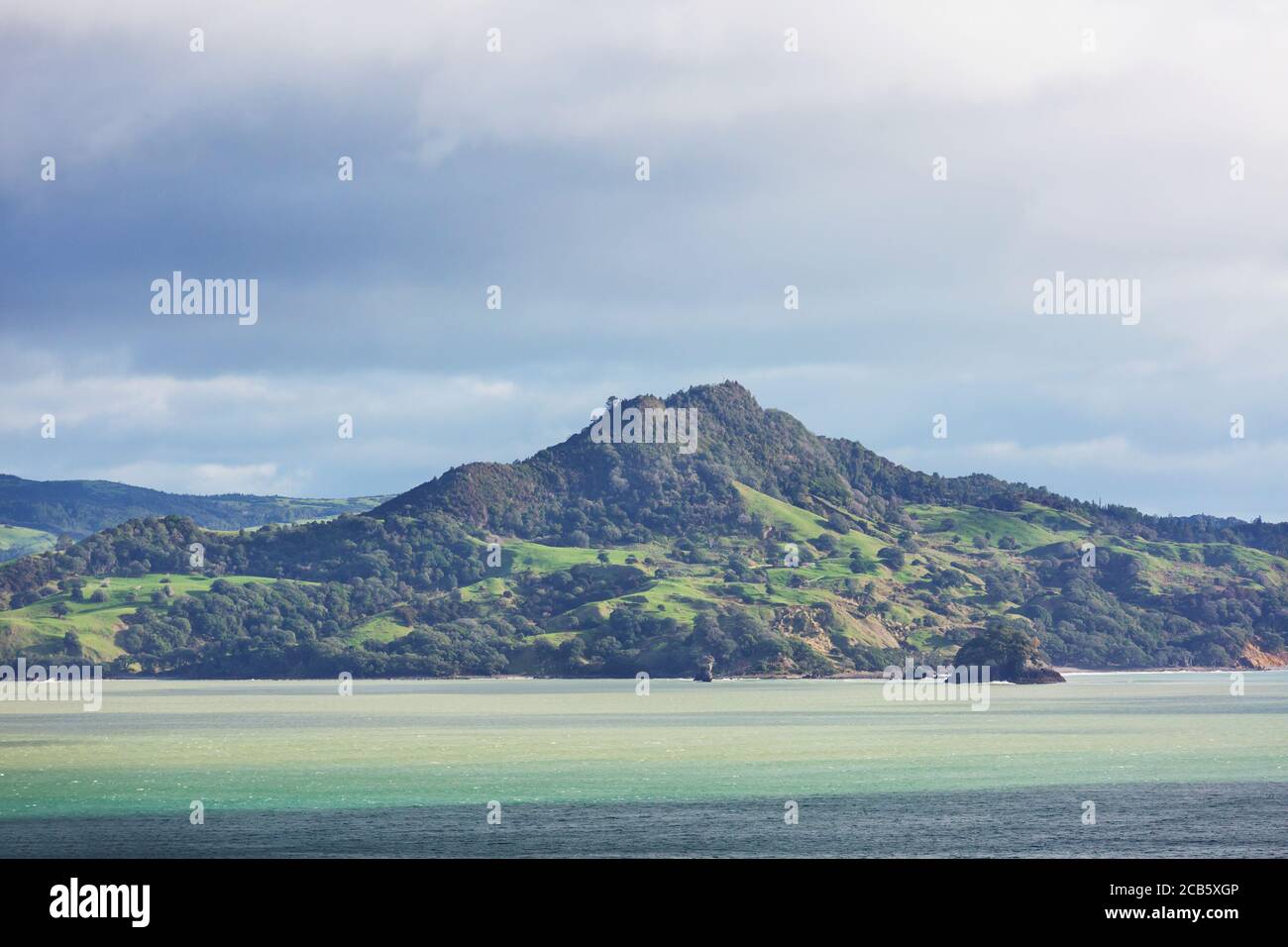 Beautiful rural landscape of the New Zealand - green hills and trees ...