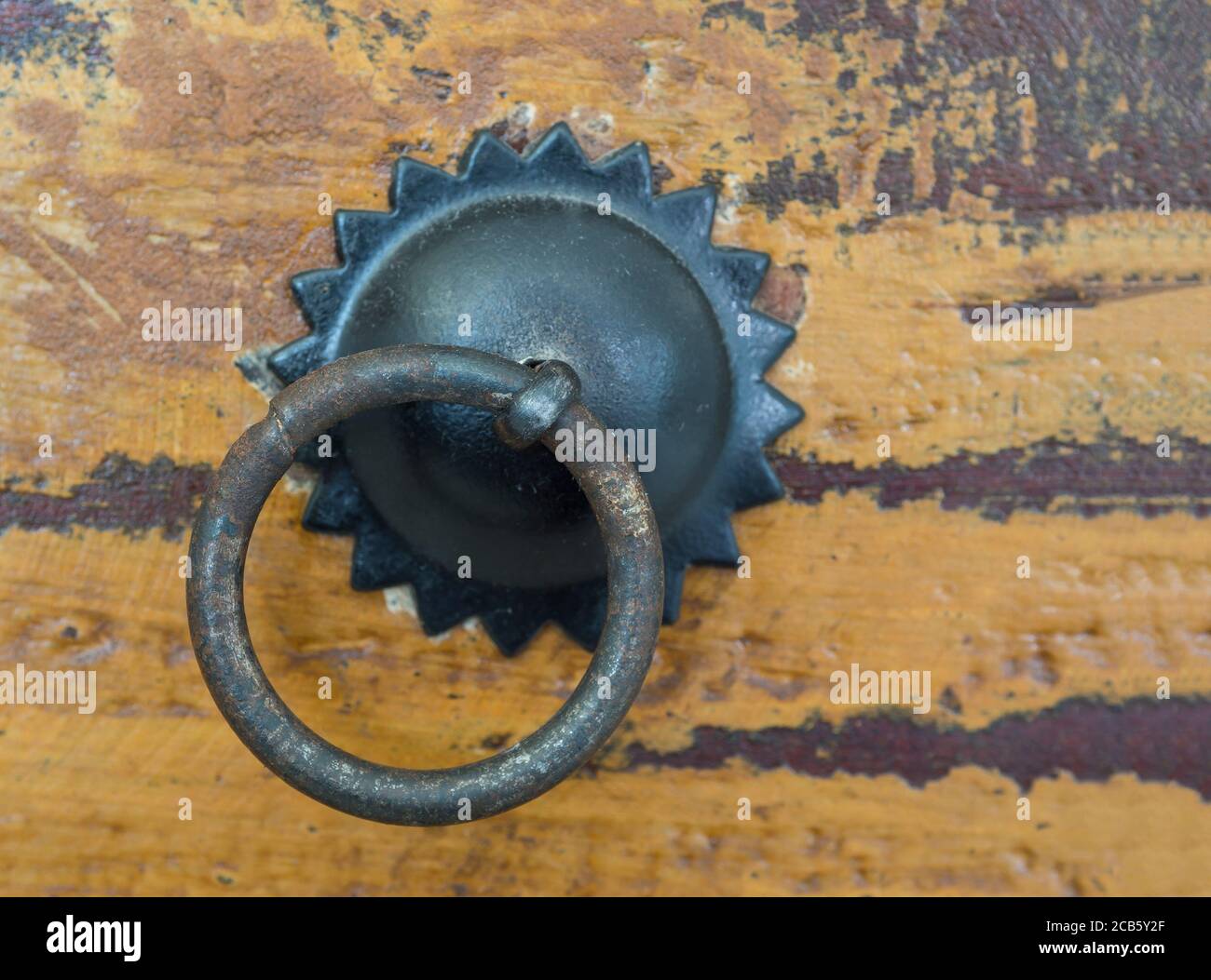 old iron pull on aged vintage wooden desk drawer Stock Photo - Alamy