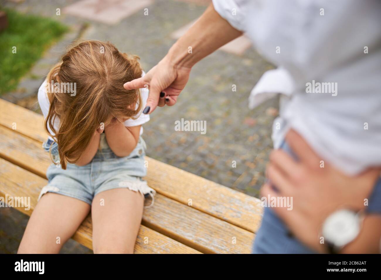 Angry lady fighting with little girl in the outdoors Stock Photo - Alamy