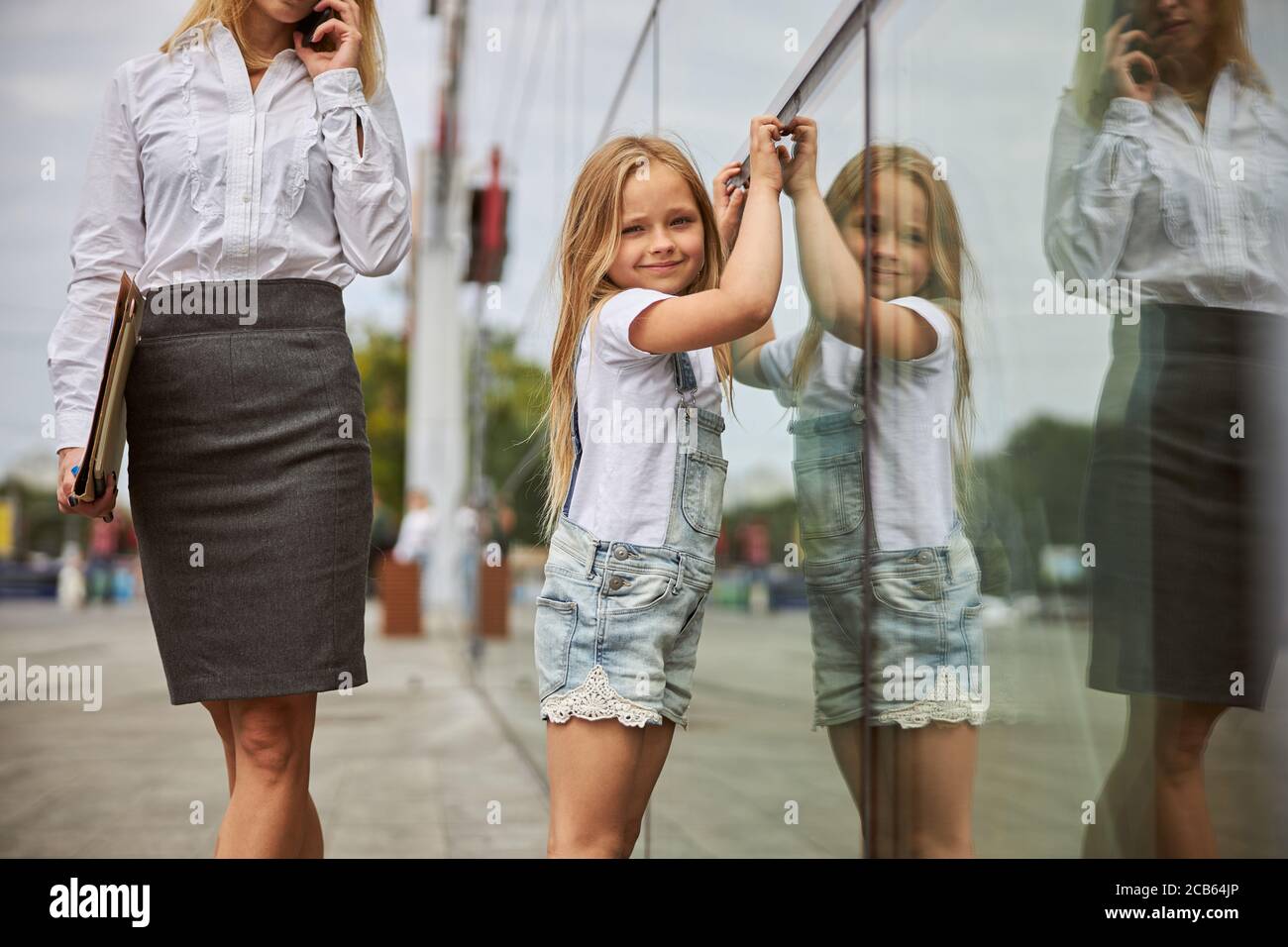 Good looking cheerful little girl having fun in the outdoors Stock ...