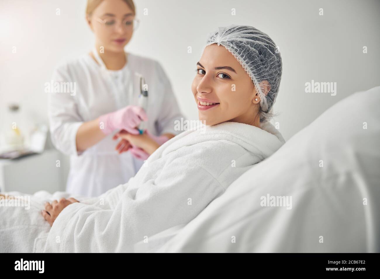 Dermatologist treating the skin on a female hand Stock Photo - Alamy