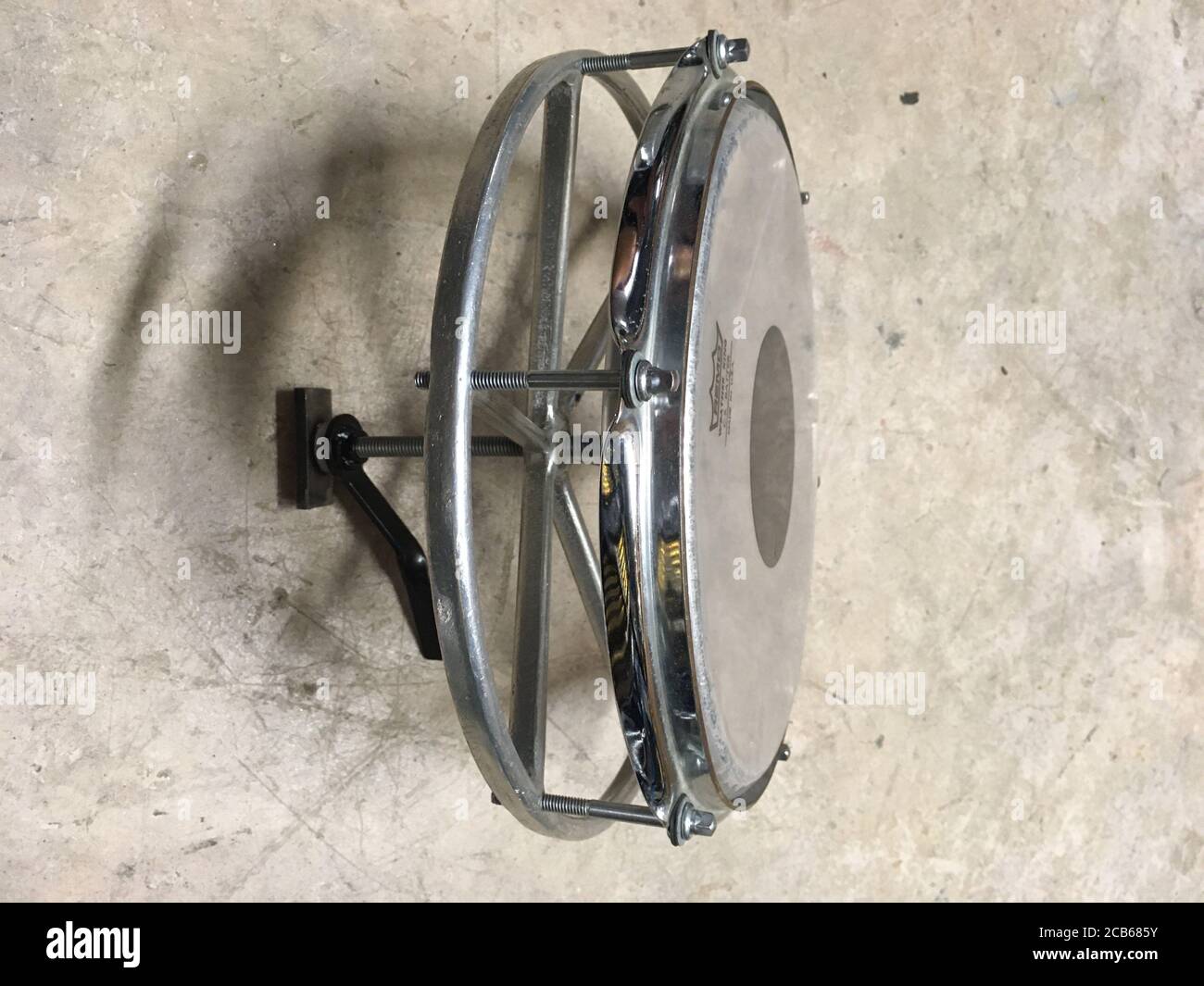 Rototoms, roto toms. Single headed drum which turns on a screw threaded ...