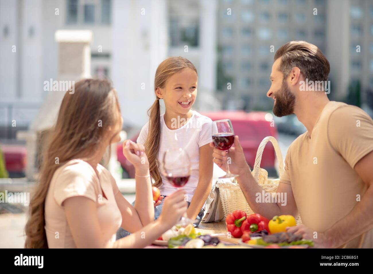 Married couple having dinner with their kid and feeling happy Stock ...