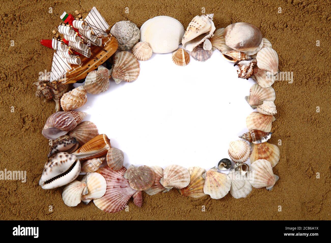 shells, sand, white paper as very nice summer background Stock Photo ...