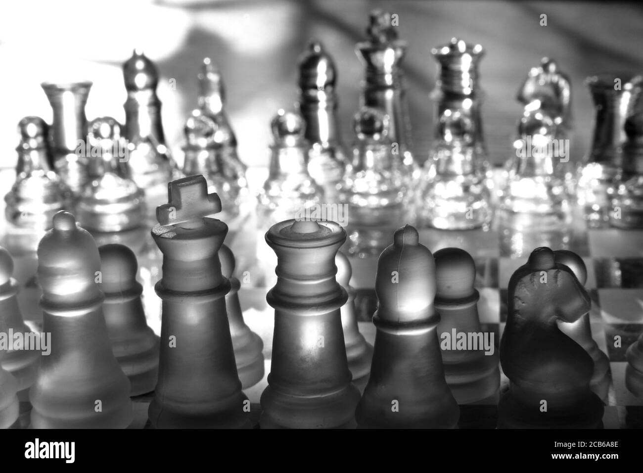 glass chess set as very nice game background Stock Photo - Alamy