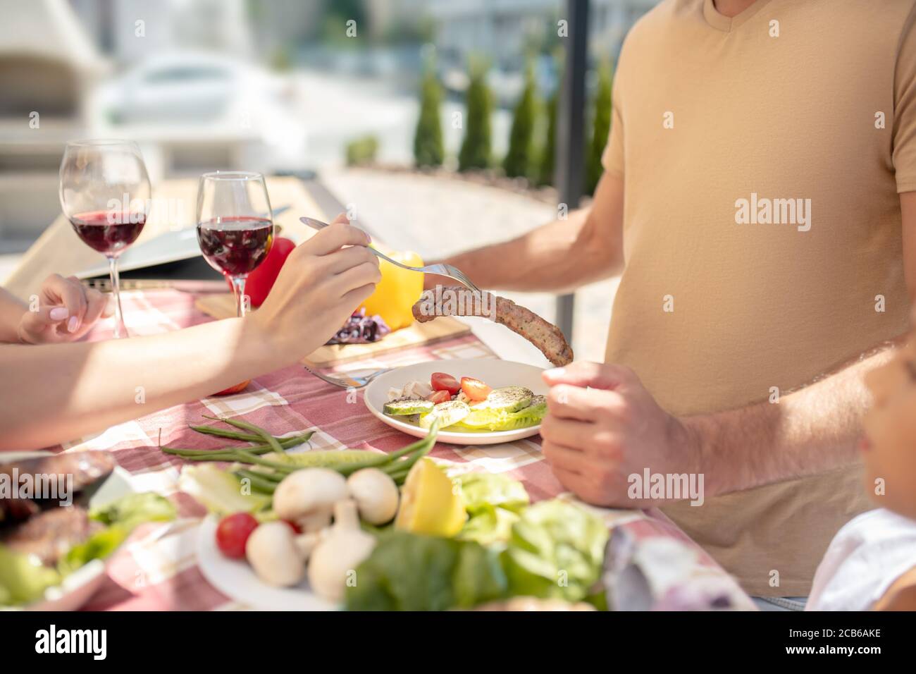 Close up picture of people having dinner Stock Photo - Alamy