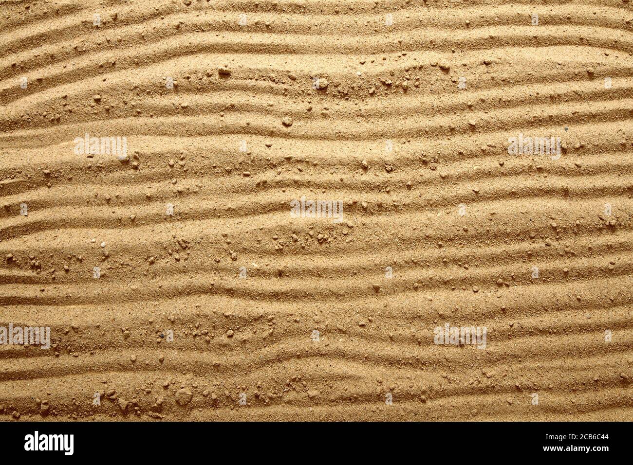 yellow sand texture (lines) as summer background Stock Photo - Alamy