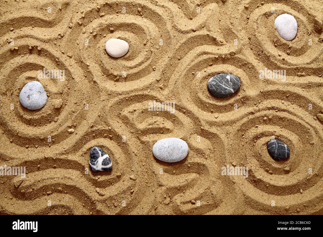 yellow sand texture (circles) as summer background Stock Photo - Alamy
