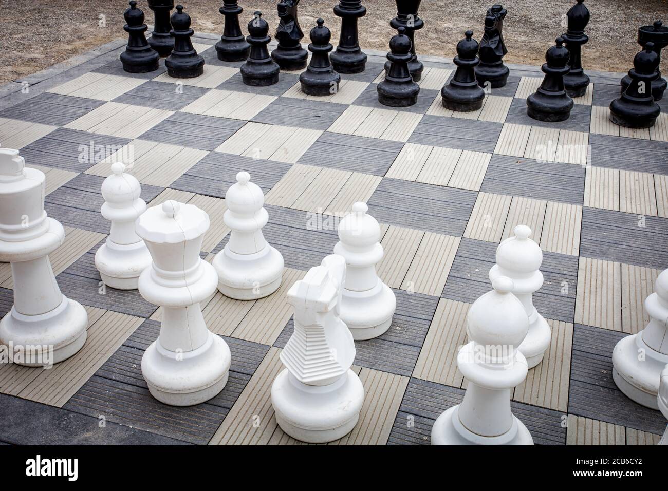 big chess set on the ground Stock Photo - Alamy