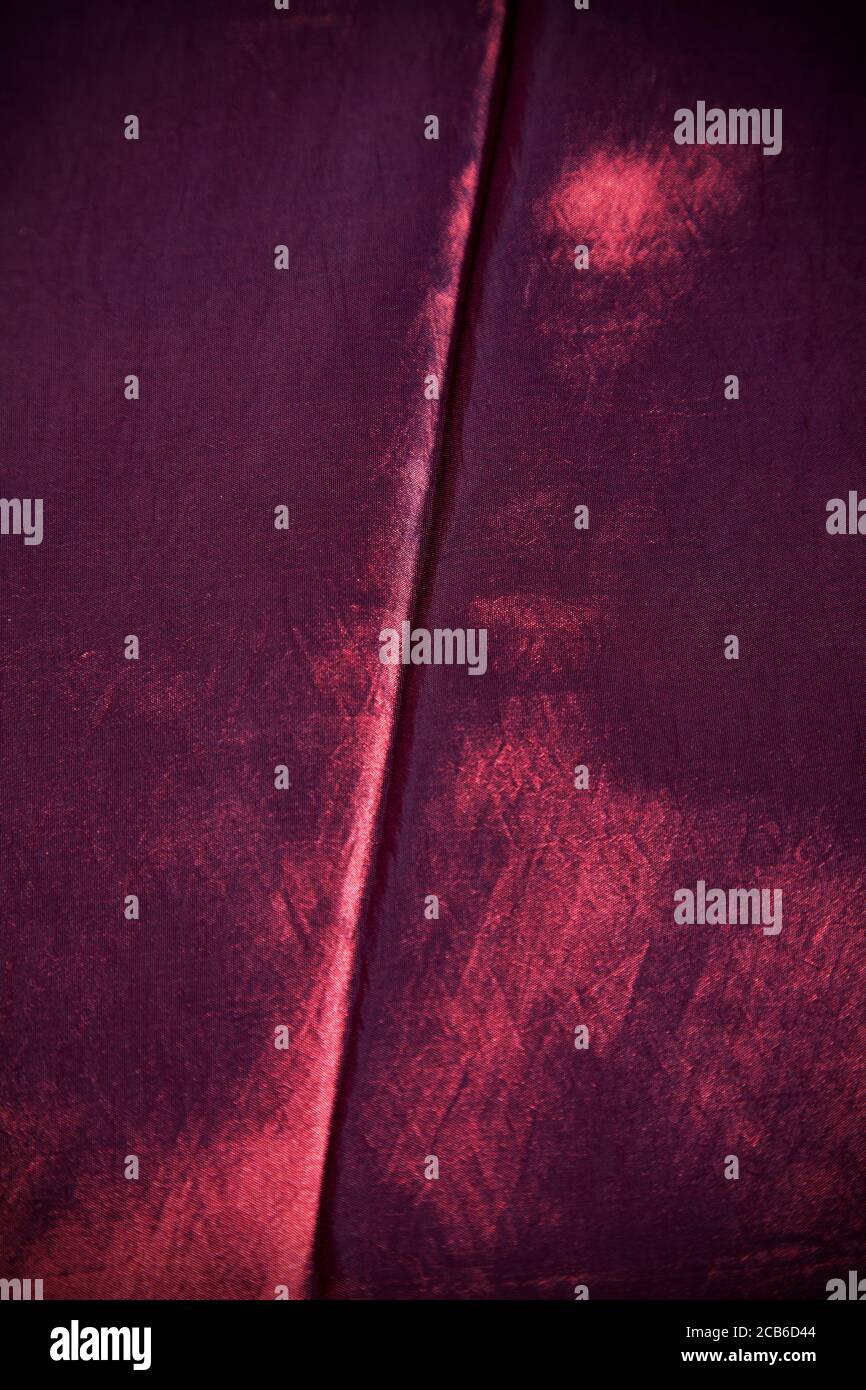 Diagonal Crease on Red Satin Fabric Stock Photo - Alamy