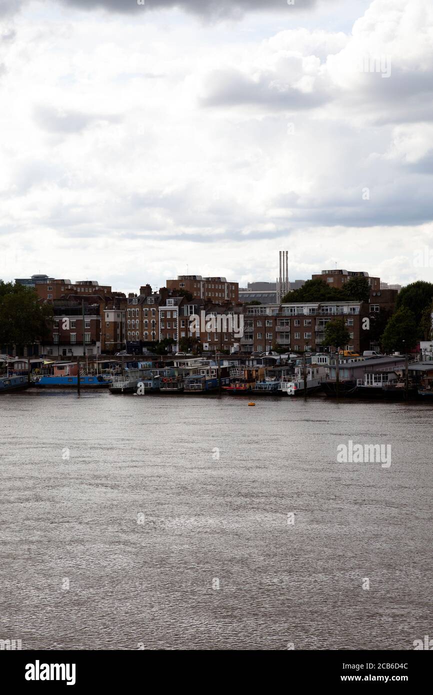 Buildinsg and Barge Homes on Chelsea Embankment in London UK Stock ...